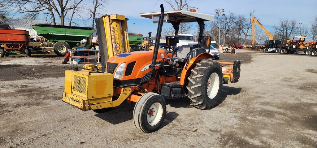 TS100 Tractor With Alamo Boom Mower For Sale - New Holland Agriculture ...