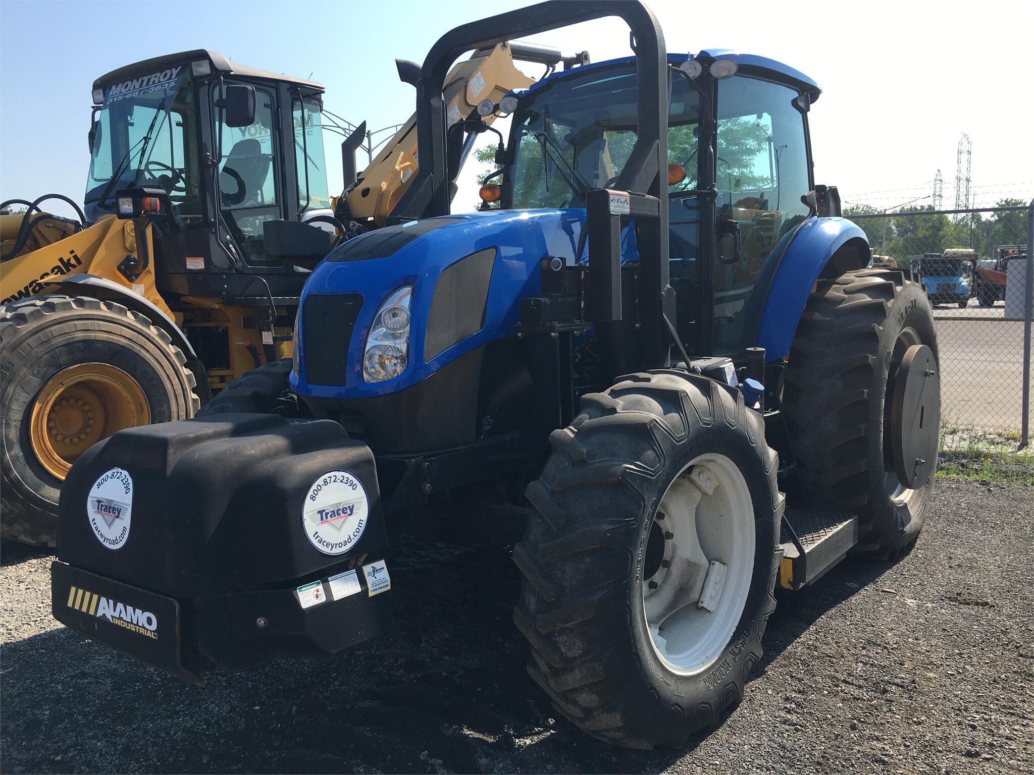 TS100 Tractor With Alamo Boom Mower For Sale - New Holland Agriculture ...